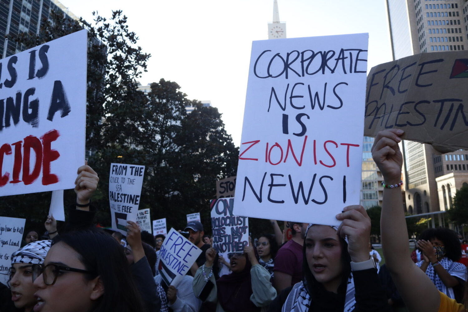 Protesters at Dallas Morning News building decry Western media coverage ...