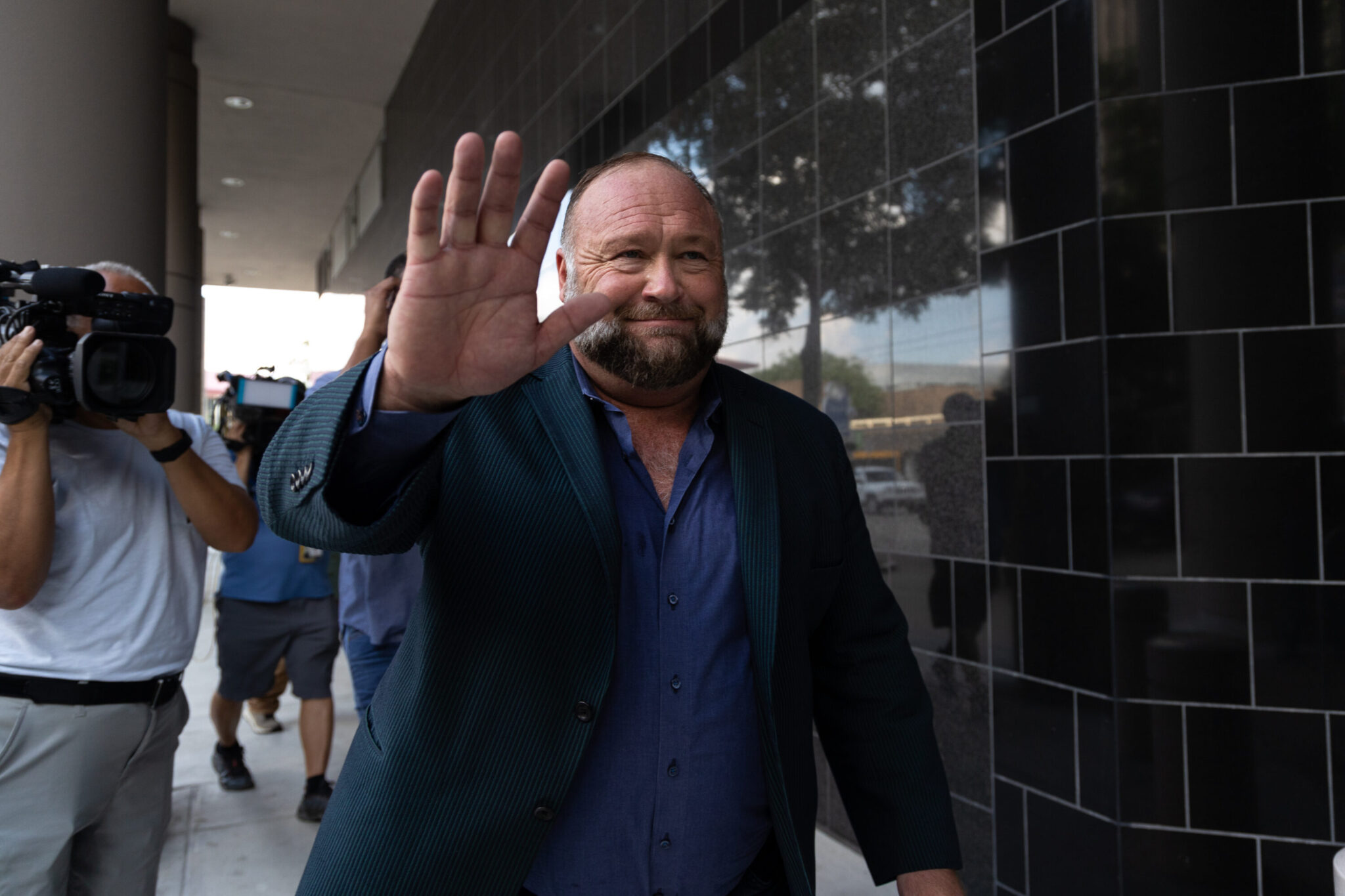 Judge allows Alex Jones to liquidate personal assets to help pay $1.5 ...