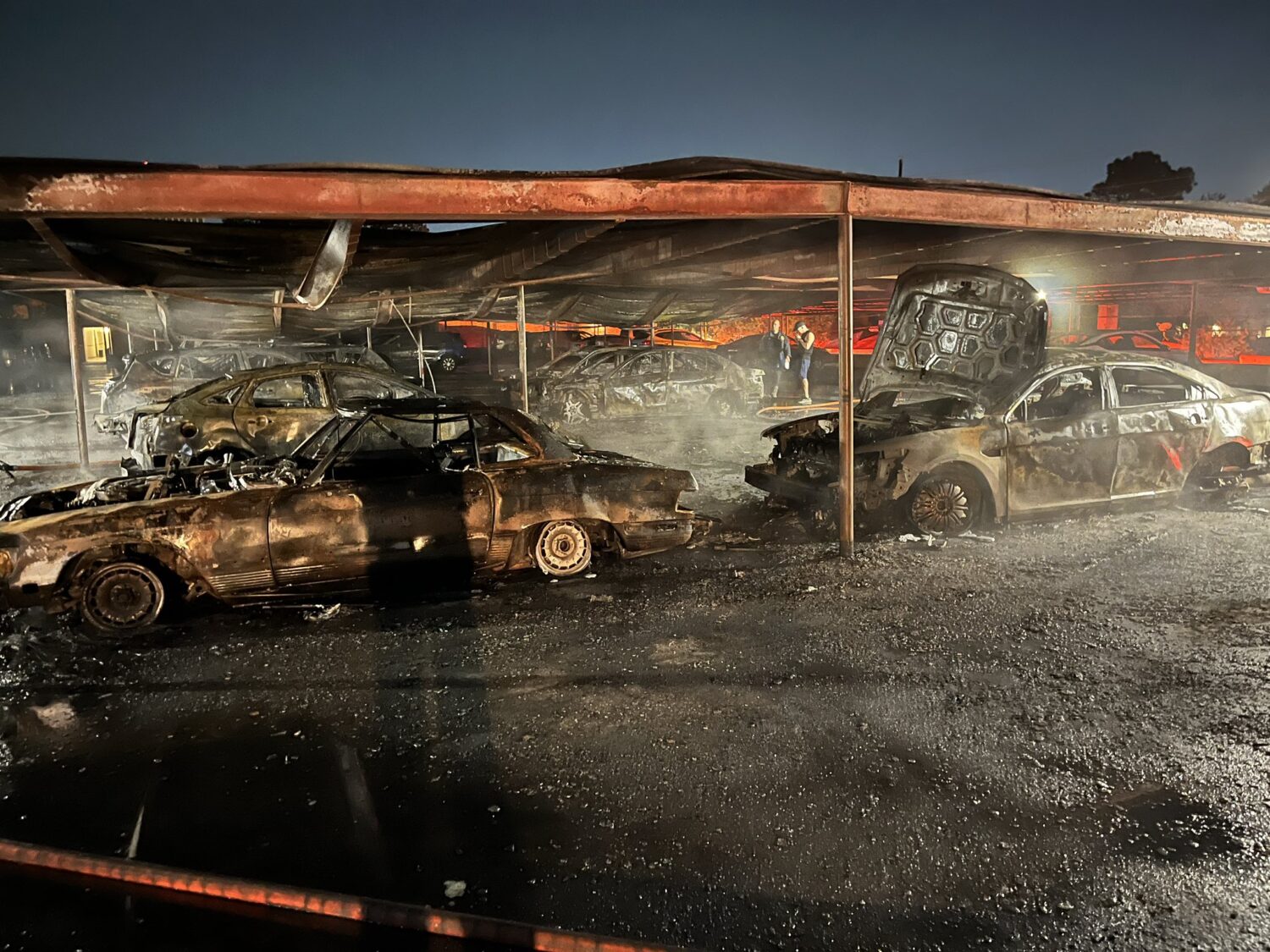 Arson investigation underway after 30 vehicles caught fire in west ...