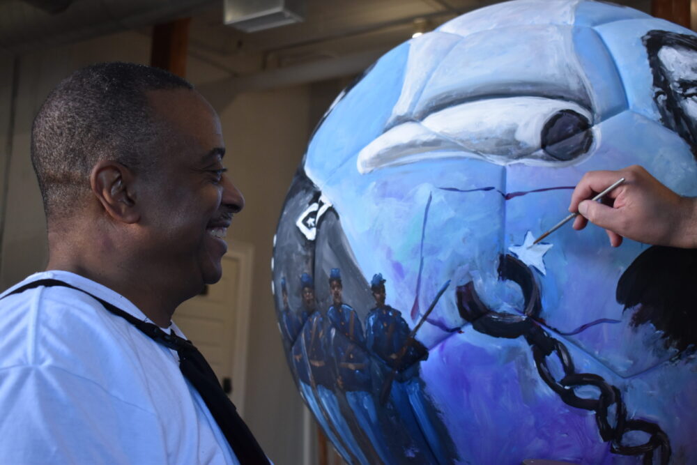 Artist transforms 2026 FIFA World Cup soccer ball into Juneteenth ...